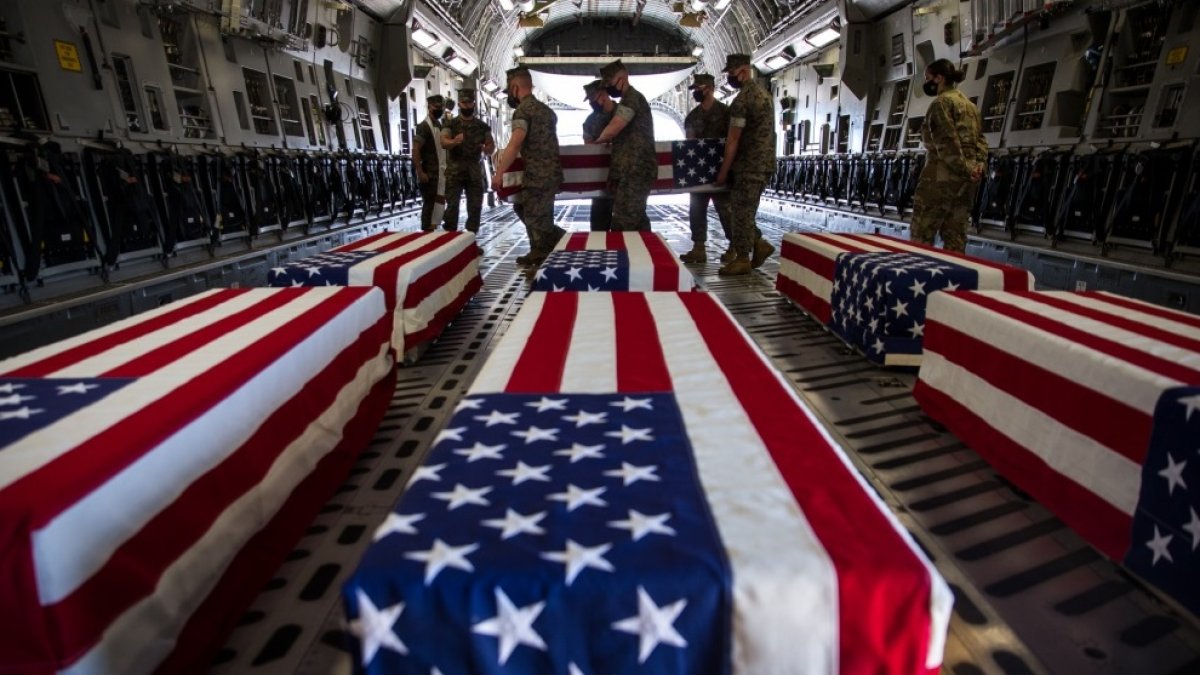 Photos: Somber Memorial Held for Fallen Military Members Killed in ...