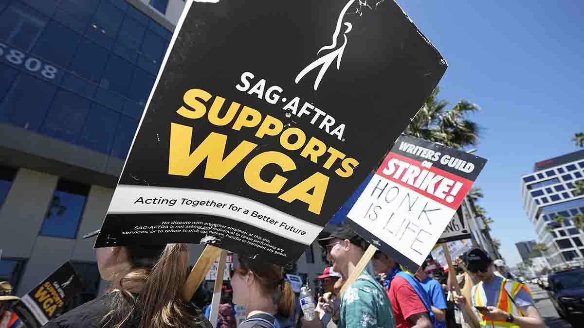 Hollywood actors join screenwriters in historic industry-stopping ...