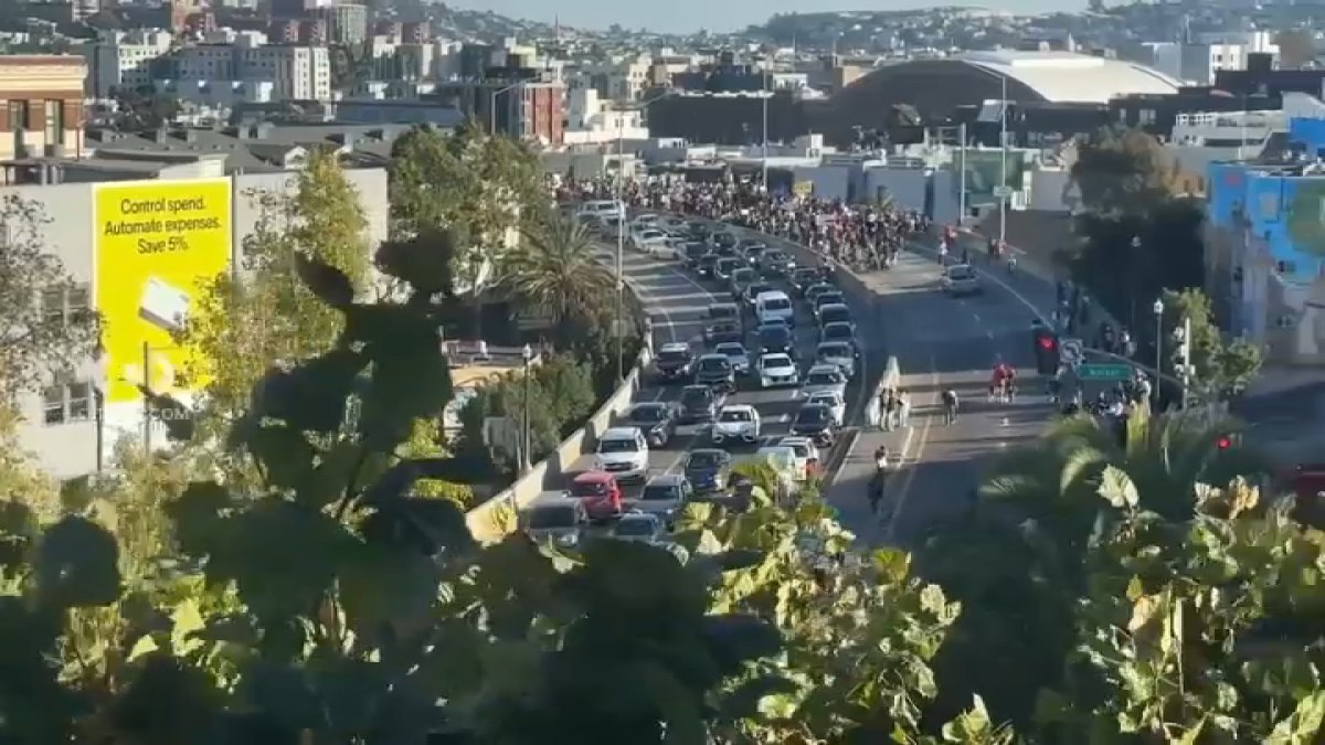 Demonstrators temporarily block lanes on Highway 101 in SF, rally for ...