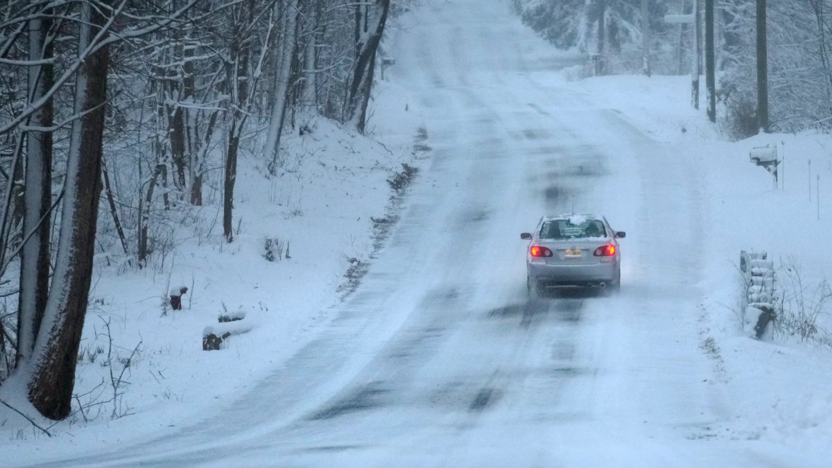 Winter storms dump snow on both U.S. coasts as icy roads make for ...