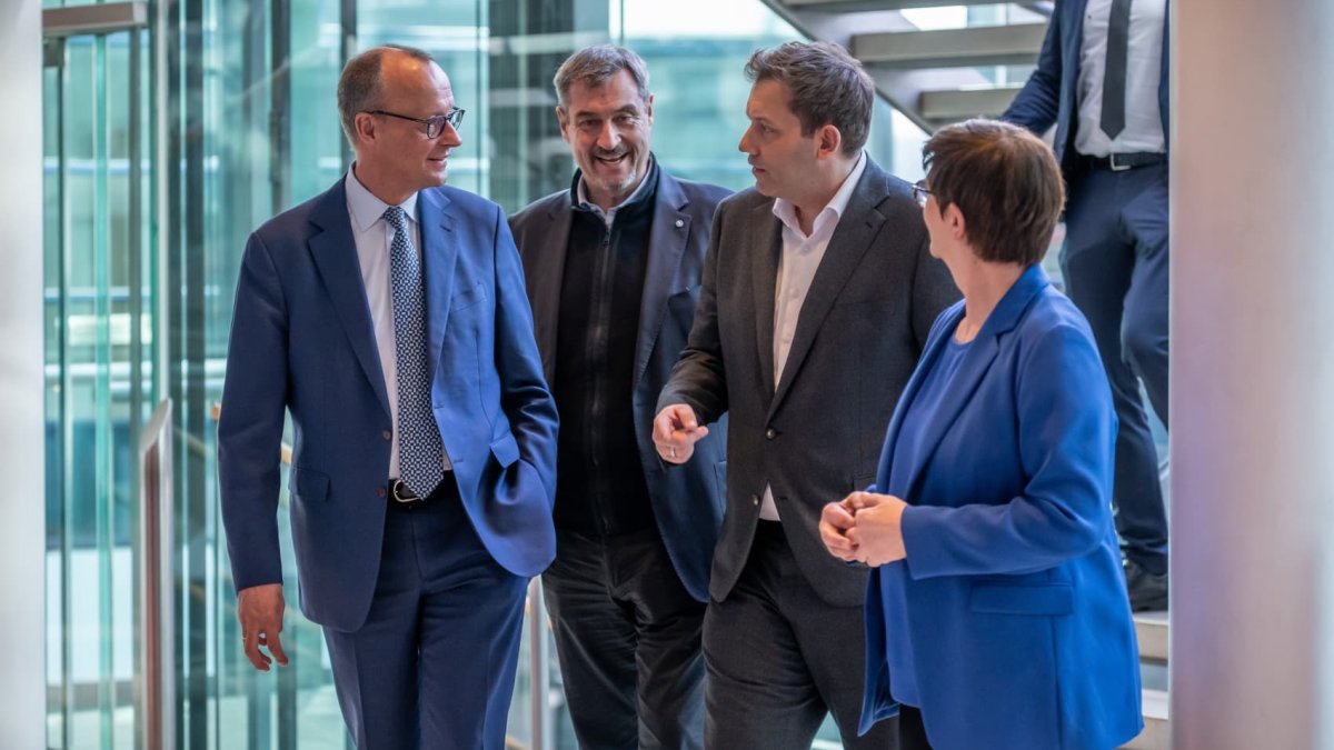 German centrist parties reach coalition deal as Trump tariffs loom over ...