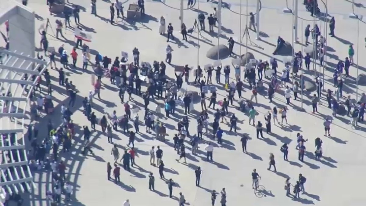 Hundreds gather outside San Jose City Hall to protest ICE activity ...