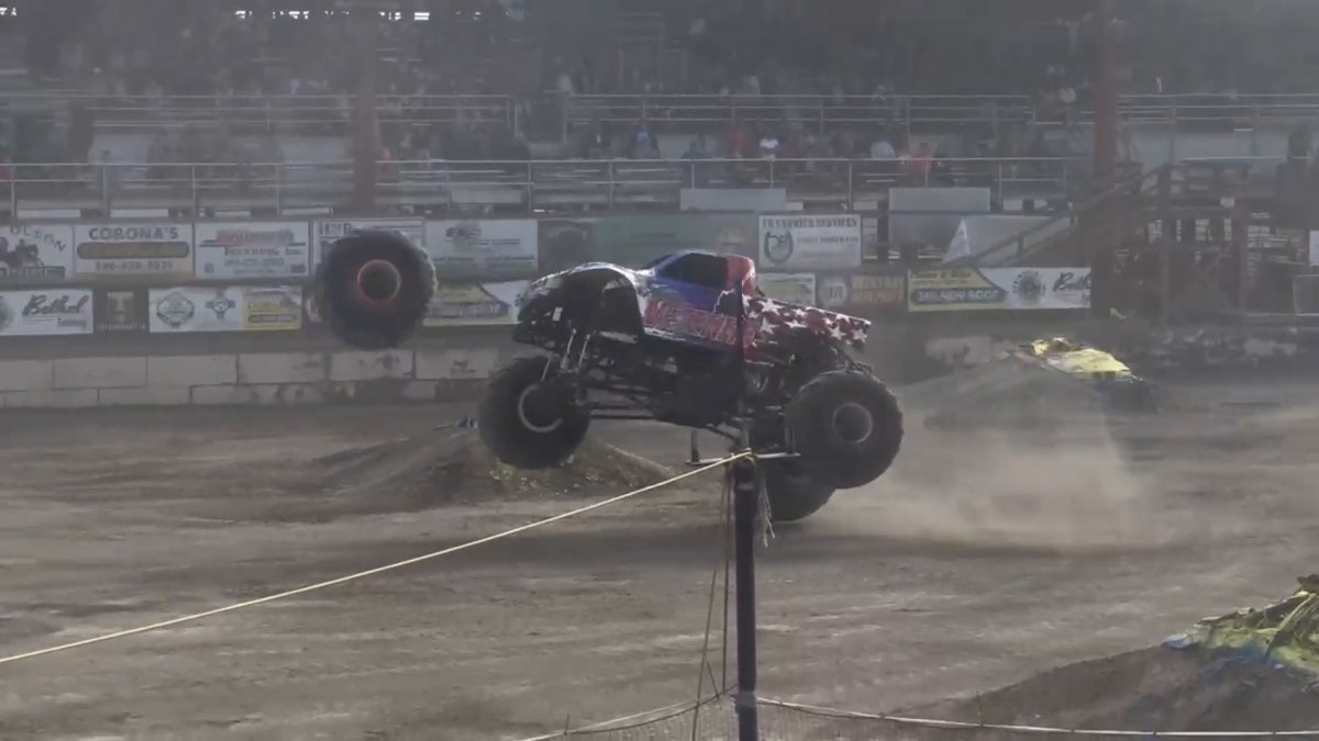 WATCH: Tire flies off monster truck during stunt, lands in parking lot ...