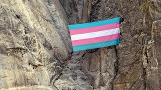 Lawsuit by Yosemite ranger fired after hanging transgender flag is ...