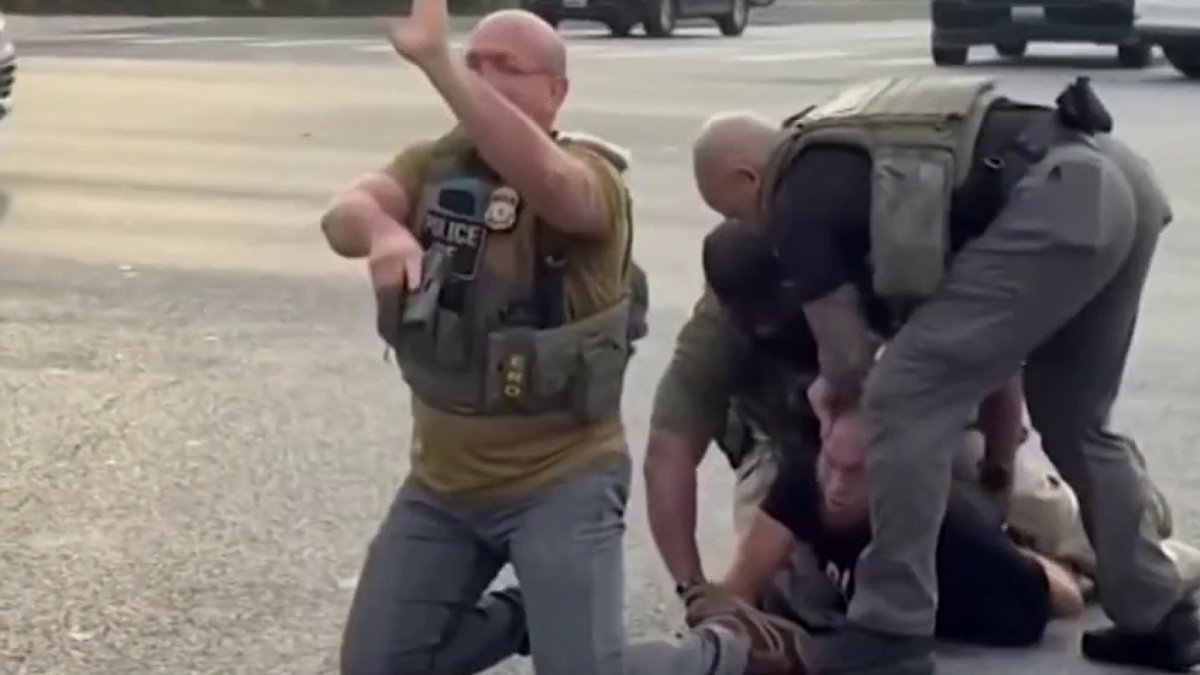 Video shows officer drop gun then appear to point it during apparent ICE arrest – NBC Bay Area